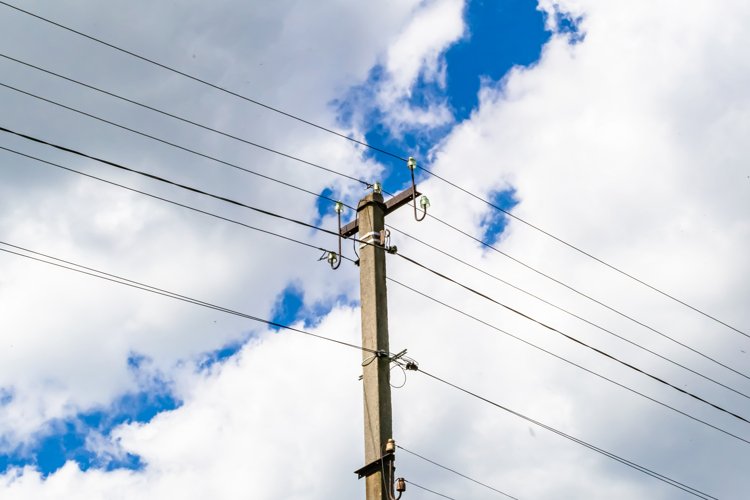 Power electric pole with line wire on coloured background
