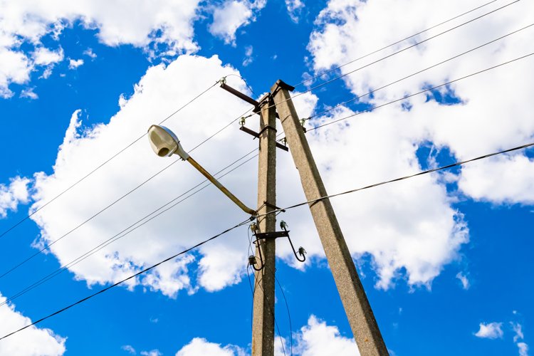 Power electric pole with line wire on coloured background