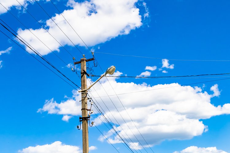 Power electric pole with line wire on coloured background
