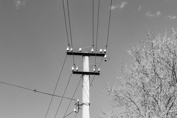 Power electric pole with line wire on coloured background