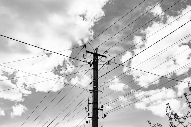 Power electric pole with line wire on coloured background