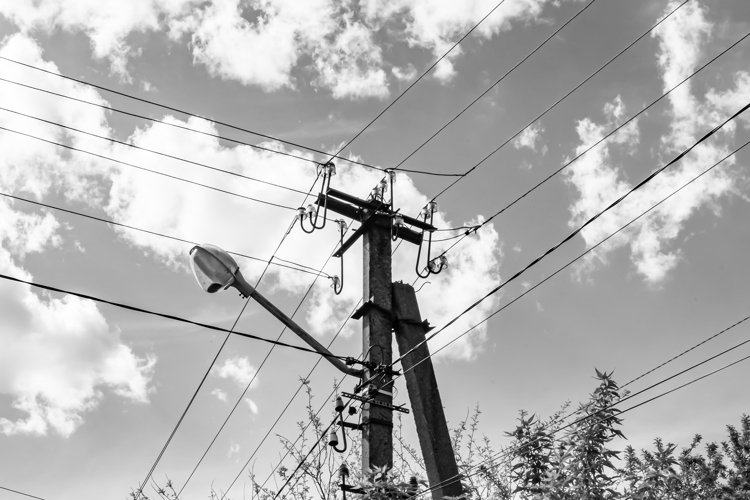 Power electric pole with line wire on coloured background