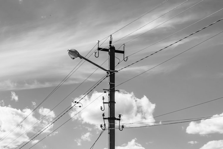 Power electric pole with line wire on coloured background