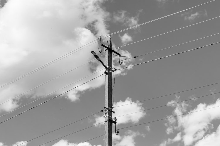 Power electric pole with line wire on coloured background