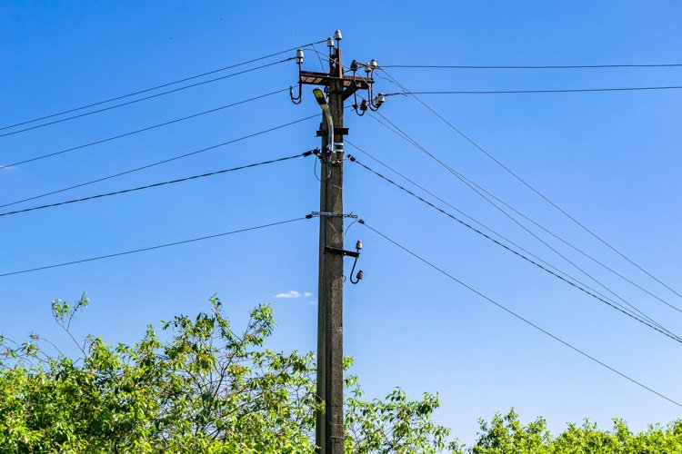 Power electric pole with line wire on coloured background