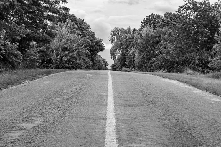 Beautiful empty asphalt road in countryside on background
