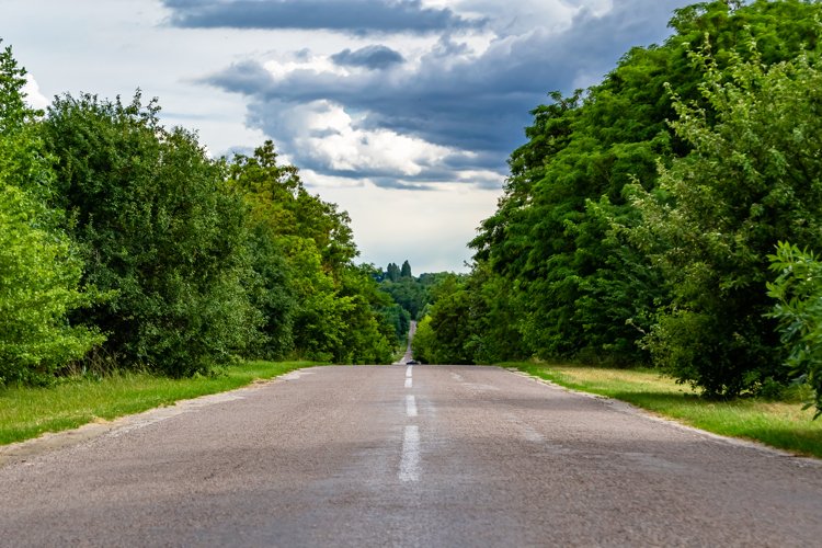 Beautiful empty asphalt road in countryside on background