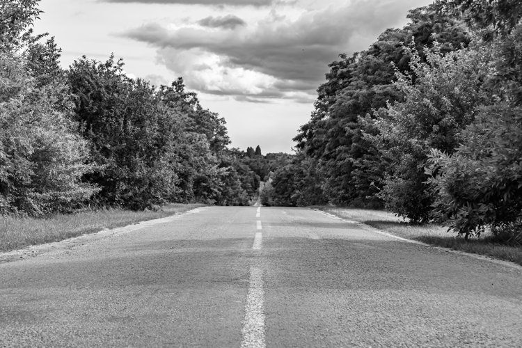 Beautiful empty asphalt road in countryside on background