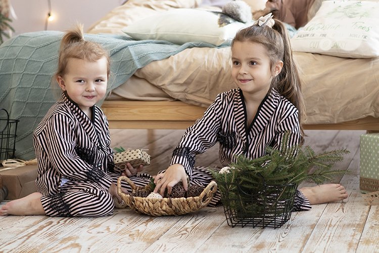 two sisters girls sorting presents in Christmas (2602666)
