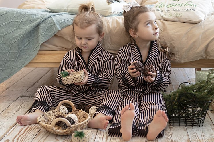 two sisters girls sorting presents in Christmas (2602671)