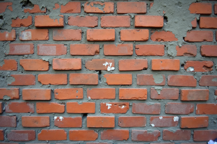 Weathered Red Bricks Background Wallpaper